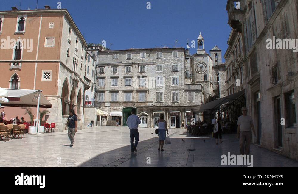Split medieval buildings around a plaza Stock Video Footage - Alamy