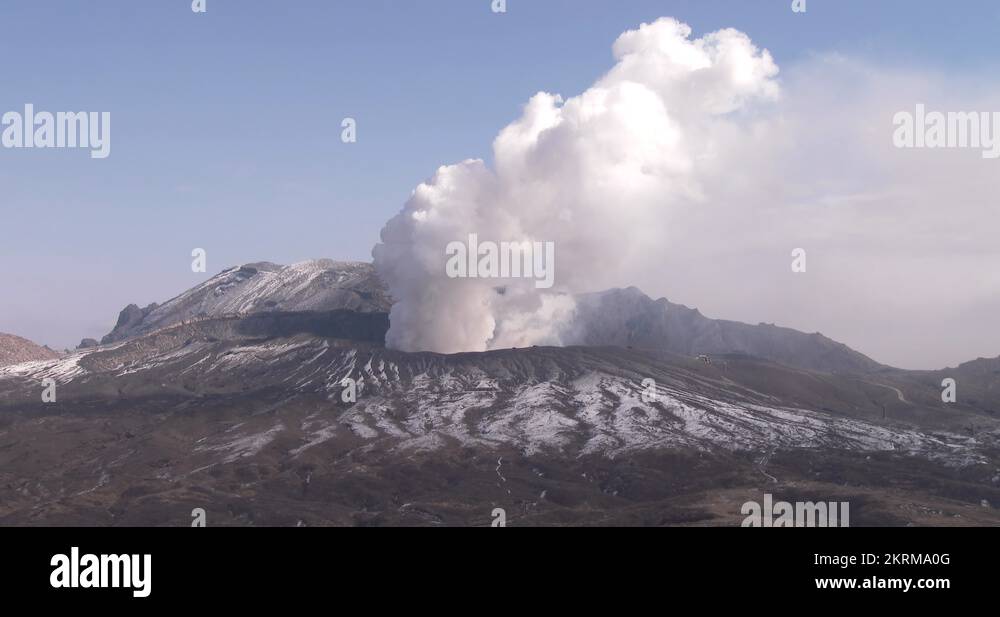 Steam Rises From Crater Of Erupting Volcano Stock Video Footage - Alamy