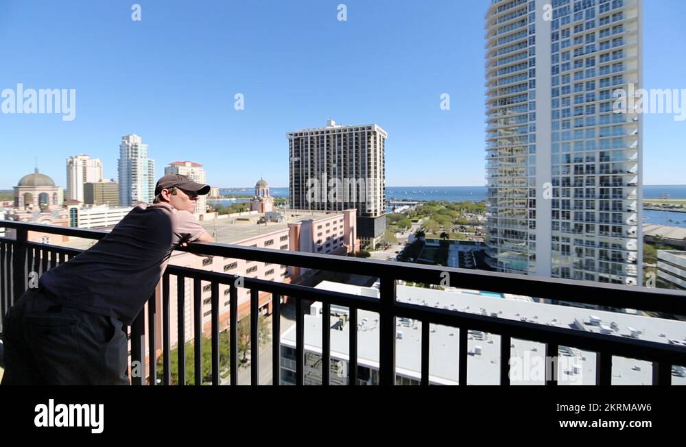 Man sitting on balcony railing Stock Videos & Footage - HD and 4K Video ...