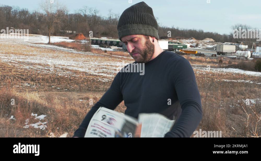 Reading newpaper Stock Videos & Footage - HD and 4K Video Clips - Alamy