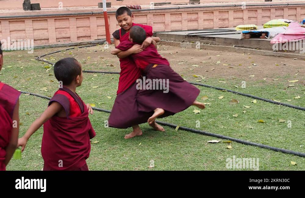 Novice Buddhist Monks Playing at the Mahabodhi Temple, Bodhgaya, Bihar ...