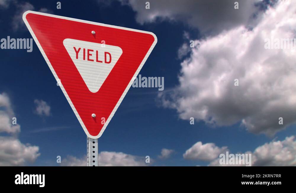 Yield road sign Stock Videos & Footage - HD and 4K Video Clips - Alamy