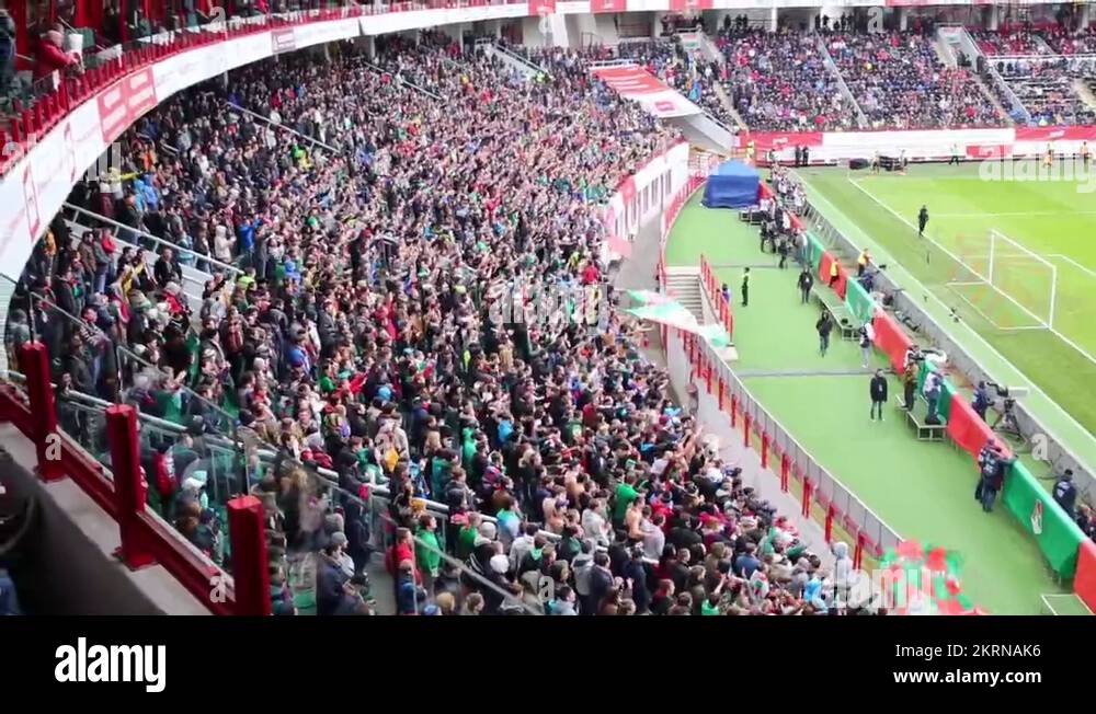 Many fans look at soccer field at stadium Locomotive Stock Video ...
