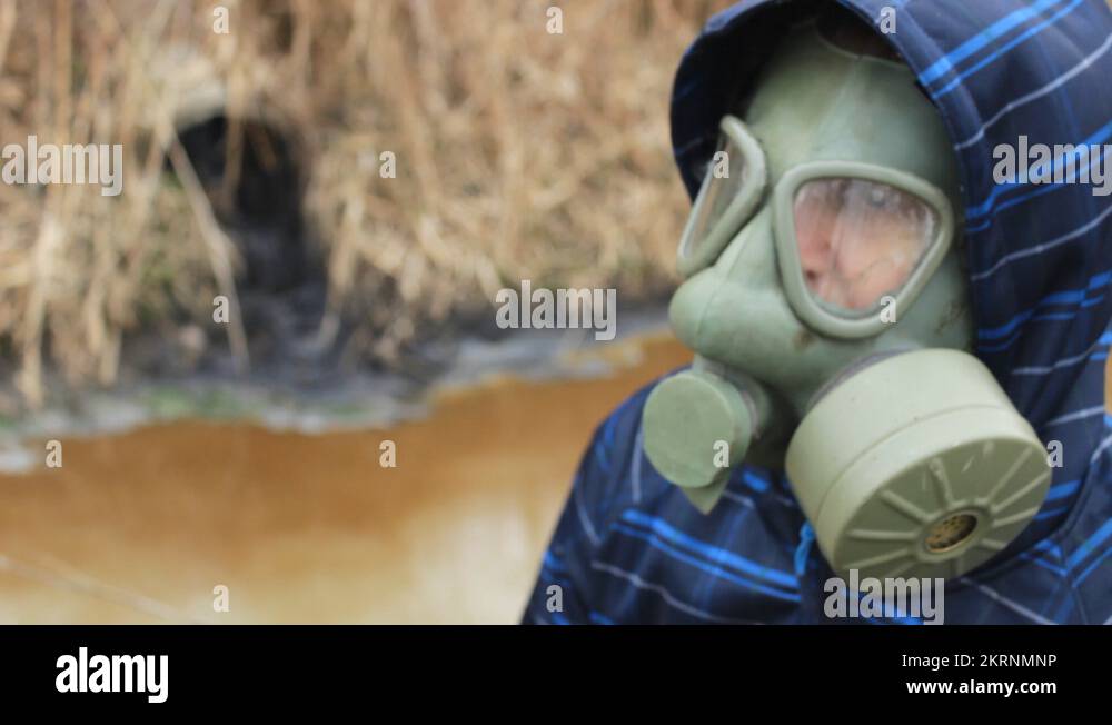 toxic water factory pollution man with a protetctive mask Stock Video ...