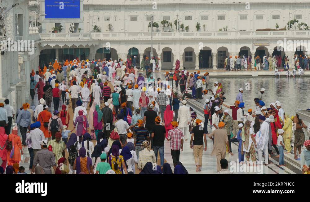 Pilgrims visit the Golden Temple complex in Amritsar, India Stock Video ...