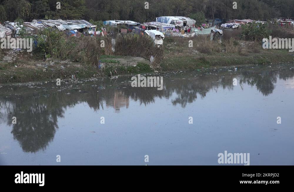 Slum on river in Stock Videos & Footage - HD and 4K Video Clips - Alamy