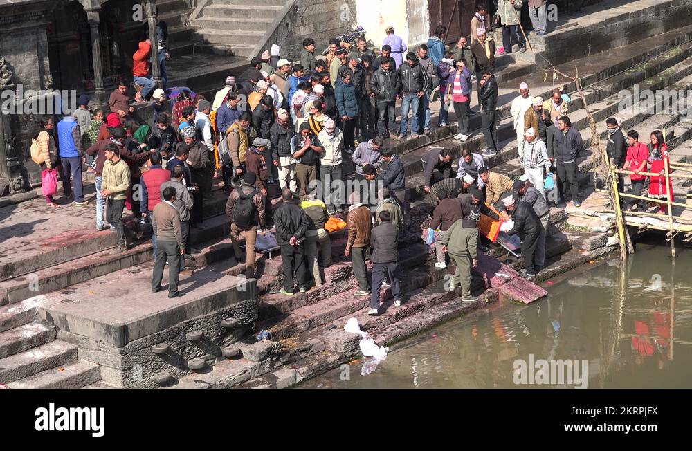 Blessings at a funeral ceremony in Pashupatinath temple in Kathmandu ...