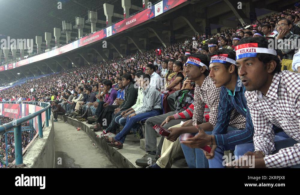India, soccer (football) crowd, cheering in Kolkata stadium, near miss ...
