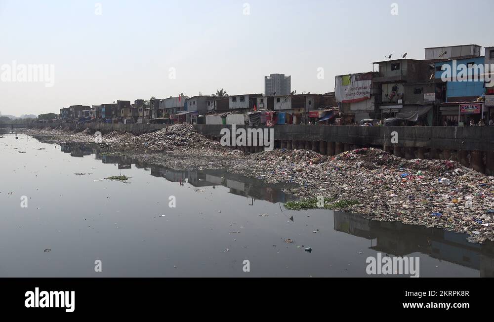 Slum housing and a polluted river in Mumbai India Stock Video Footage ...
