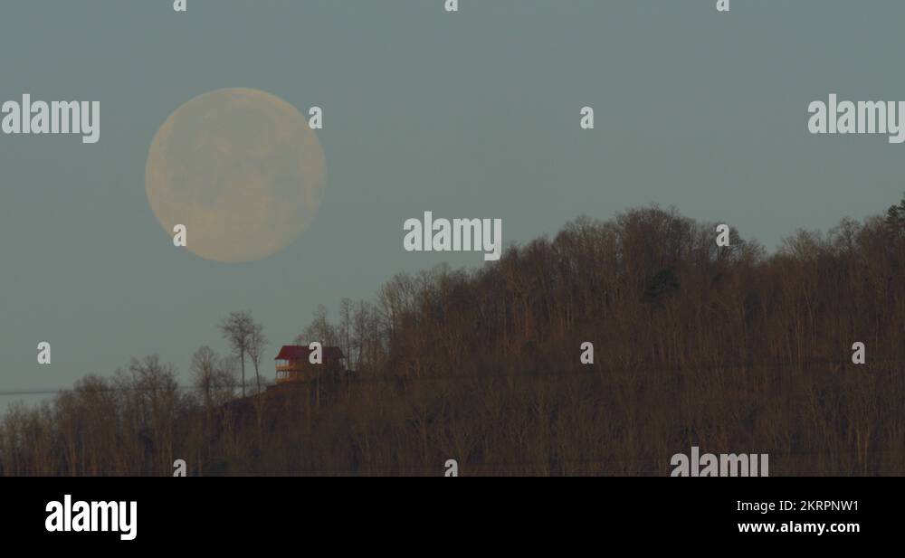 Moon setting at dawn Stock Videos & Footage - HD and 4K Video Clips - Alamy