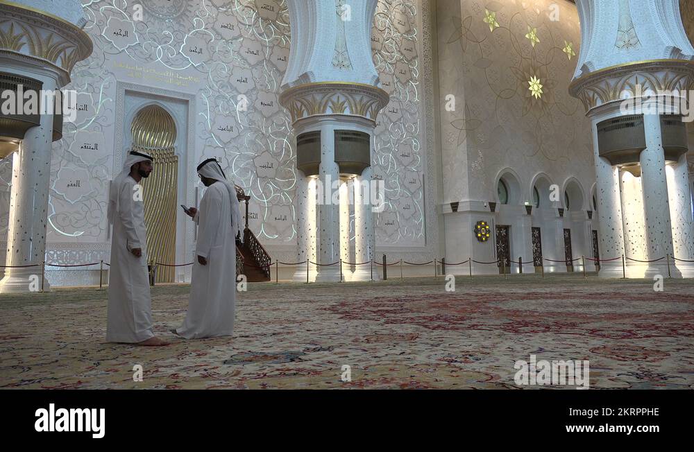 Two guides inside the Sheikh Zayed Grand Mosque in Abu Dhabi Stock ...