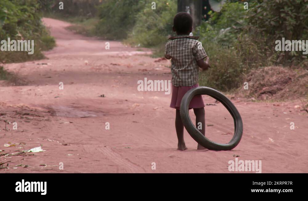 Boy playing tire Stock Videos & Footage - HD and 4K Video Clips - Alamy