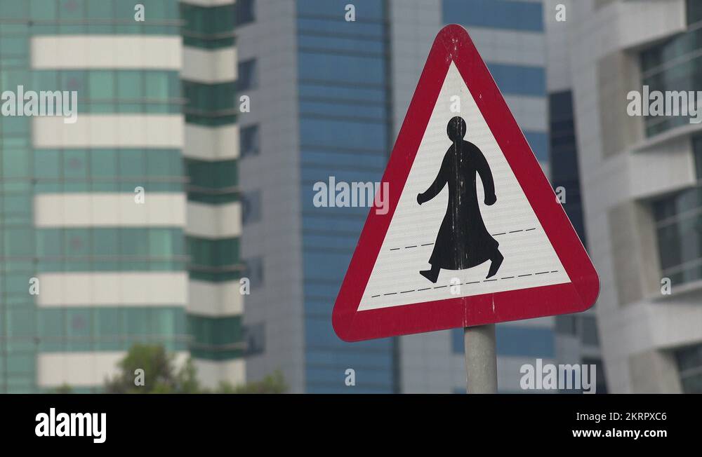 Middle East, pedestrian crossing, traditional dress, Doha, Qatar Stock ...