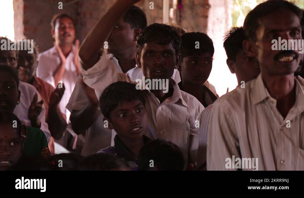 Indian men singing with hands lifted up Stock Video Footage - Alamy