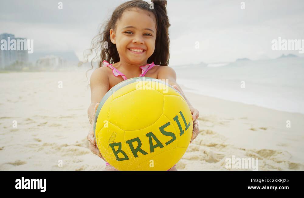 Cute little girl smiles with soccer ball Stock Video Footage - Alamy