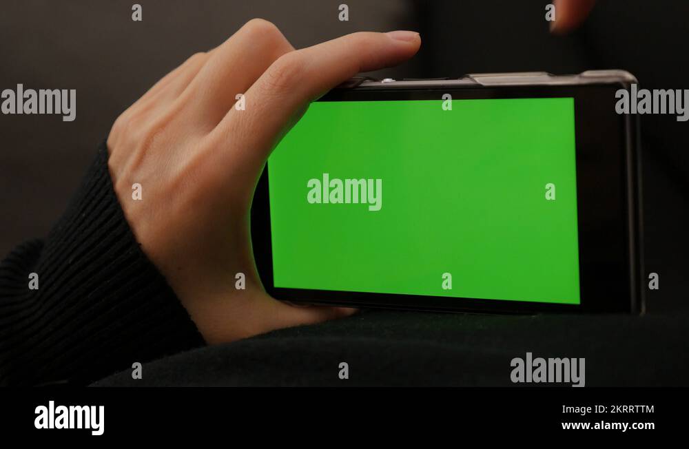Content scrolling on mobile phone green screen display 4K 2160p UHD ...