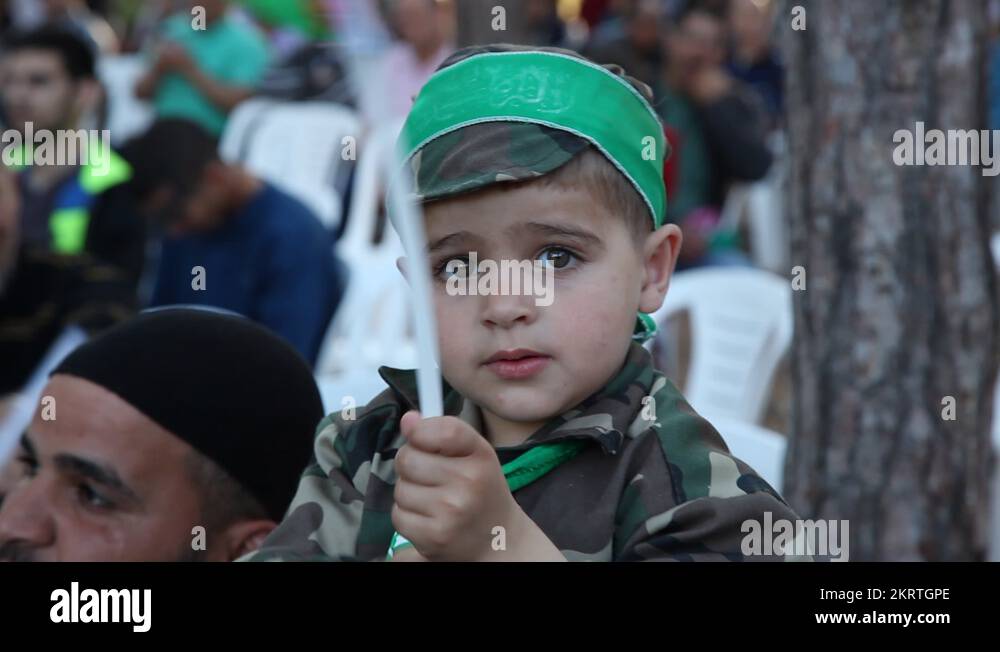 A child with flag Nakba Day or Day of the Catastrophe commemoration ...
