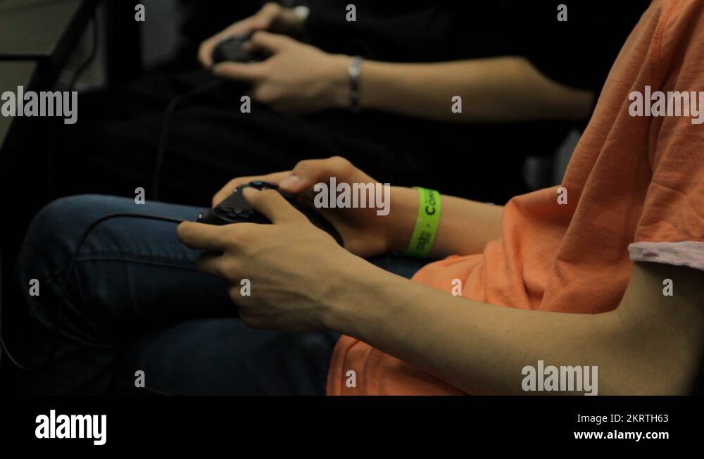 Gaming Tournament At Convention, Kids Playing Video Games, Comicon ...