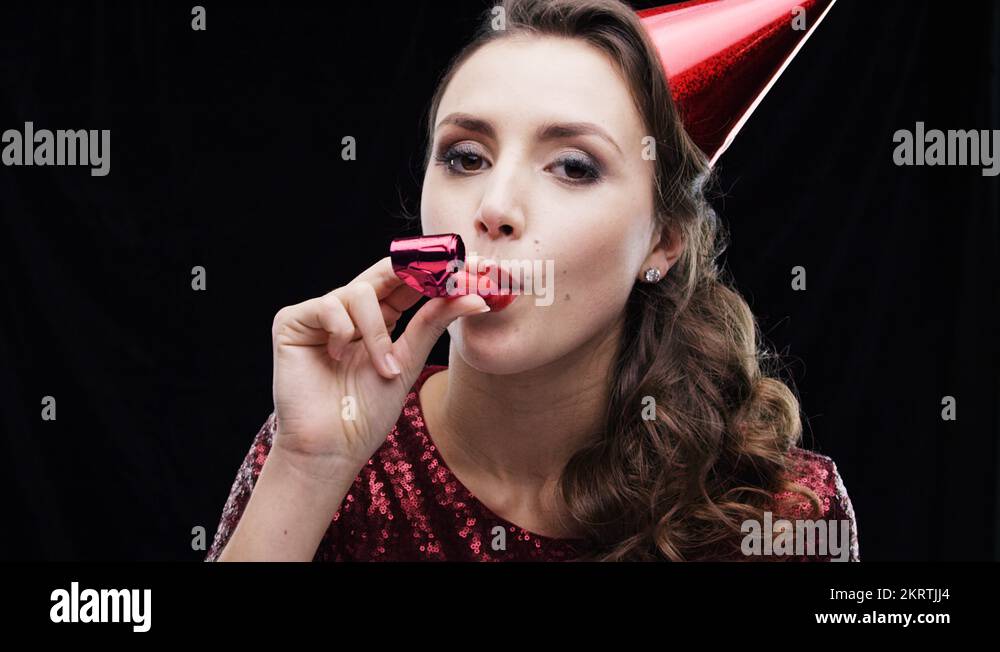 Red party blower Stock Videos & Footage - HD and 4K Video Clips - Alamy