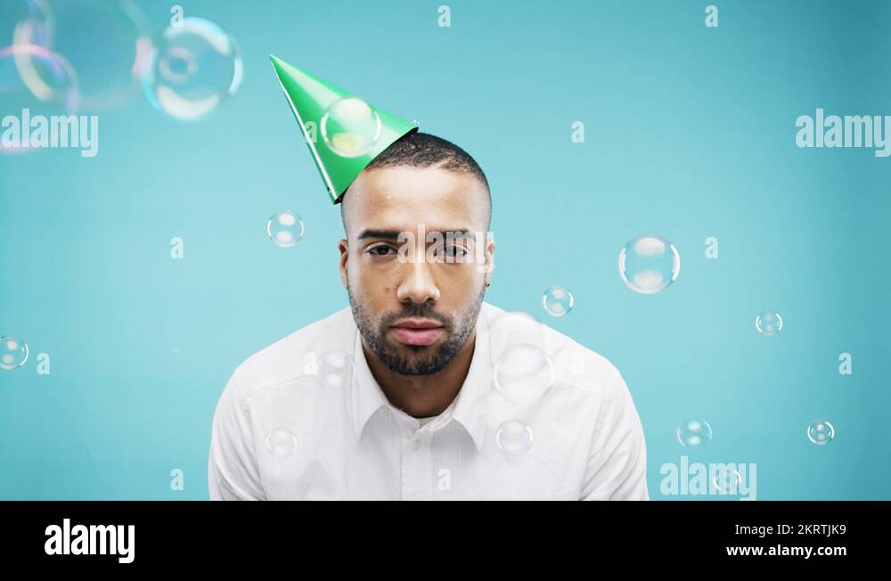 Single man is sad in bubble shower slow motion photo booth blue ...