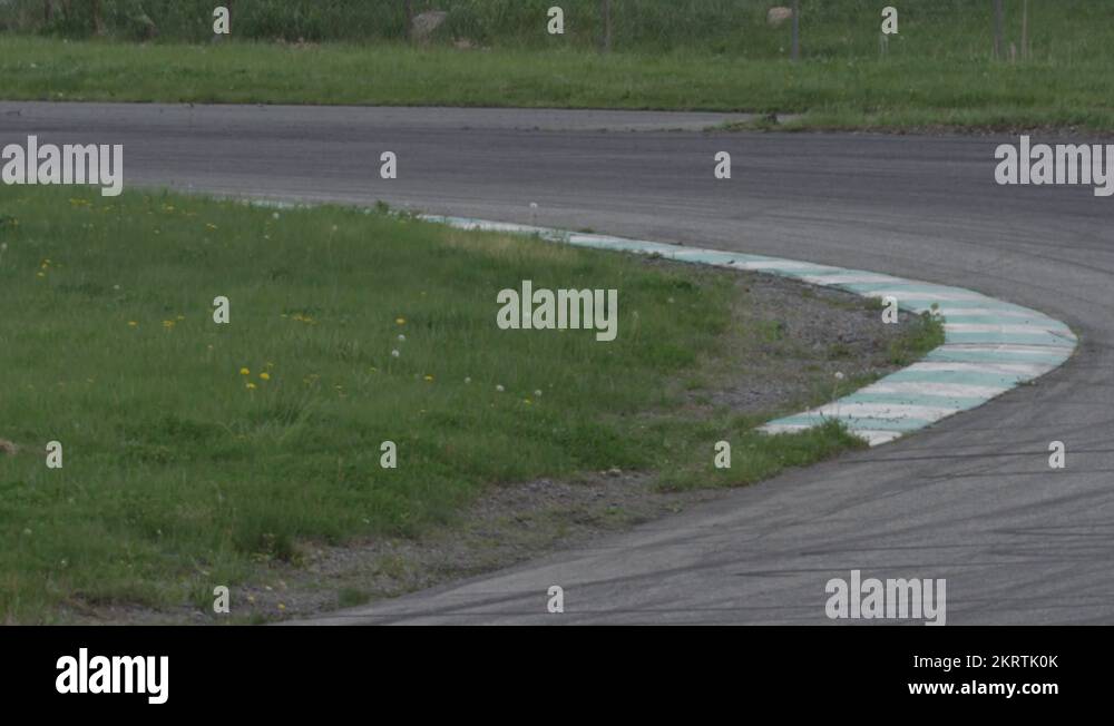 Race cars drifting on a track at a motorsport park Stock Video Footage ...