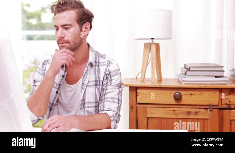 A concentrated man thinking before his computer Stock Video Footage - Alamy