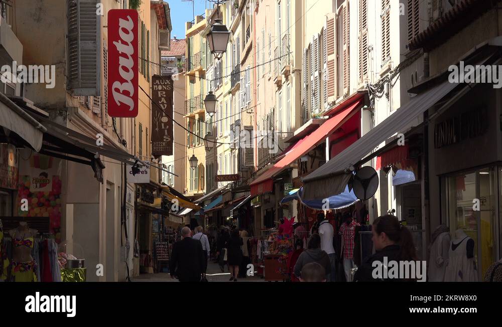 People walk in Rue Meynadier in Old Town Cannes, France Stock Video ...