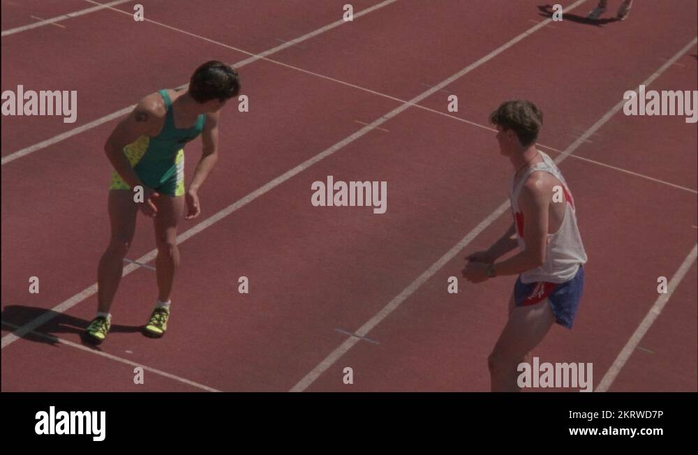 Relay race runners Stock Videos & Footage - HD and 4K Video Clips - Alamy