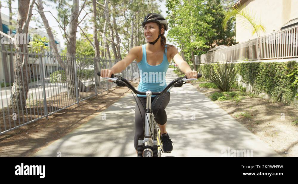 Fit lady on bike Stock Videos & Footage - HD and 4K Video Clips - Alamy
