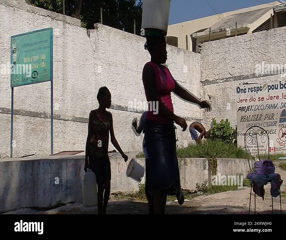 Woman carrying bucket on head Stock Videos & Footage - HD and 4K Video ...