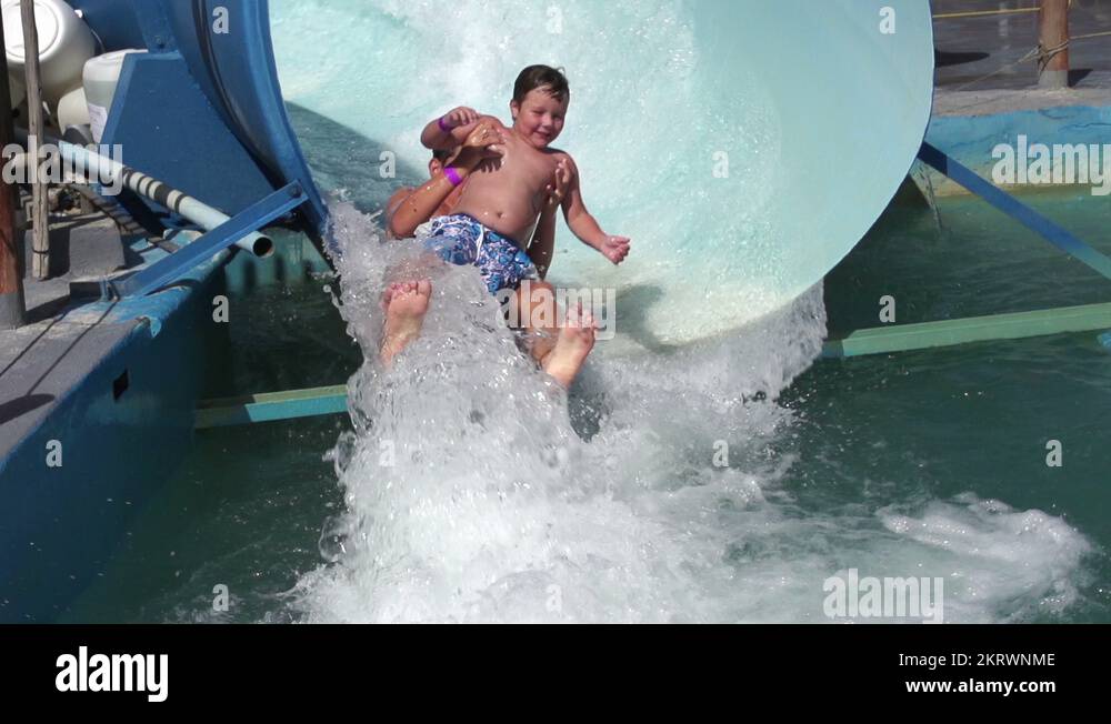 Sliding on a water slide Stock Videos & Footage - HD and 4K Video Clips ...