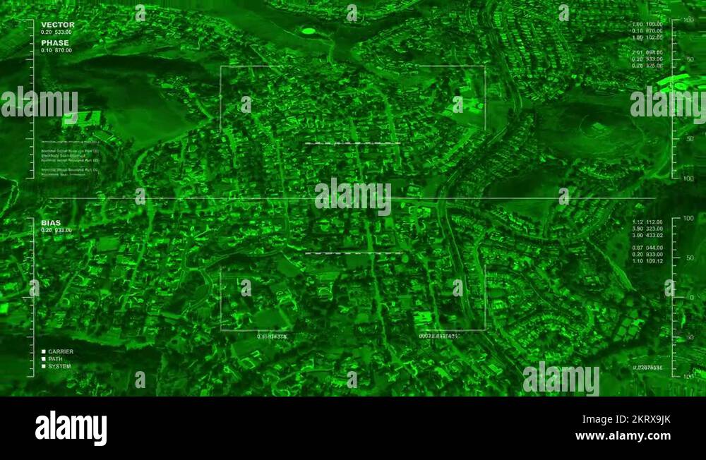 Night vision aerial surveillance drone/UAV flyover of an urban or ...