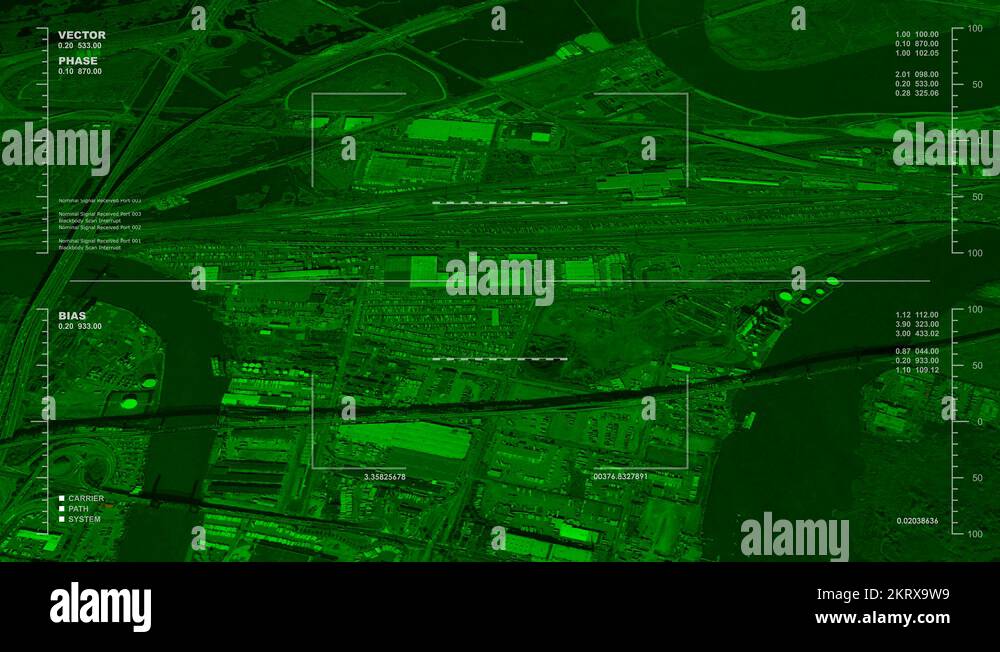 Night vision aerial surveillance drone/UAV flyover of an urban rail ...