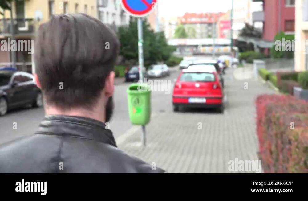 Back shot young man walking Stock Videos & Footage - HD and 4K Video ...