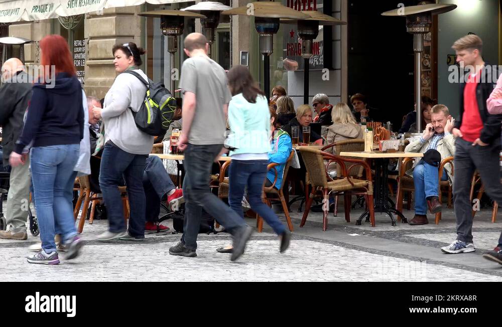 city - urban street - sidewalk with walking people - restaurant ...