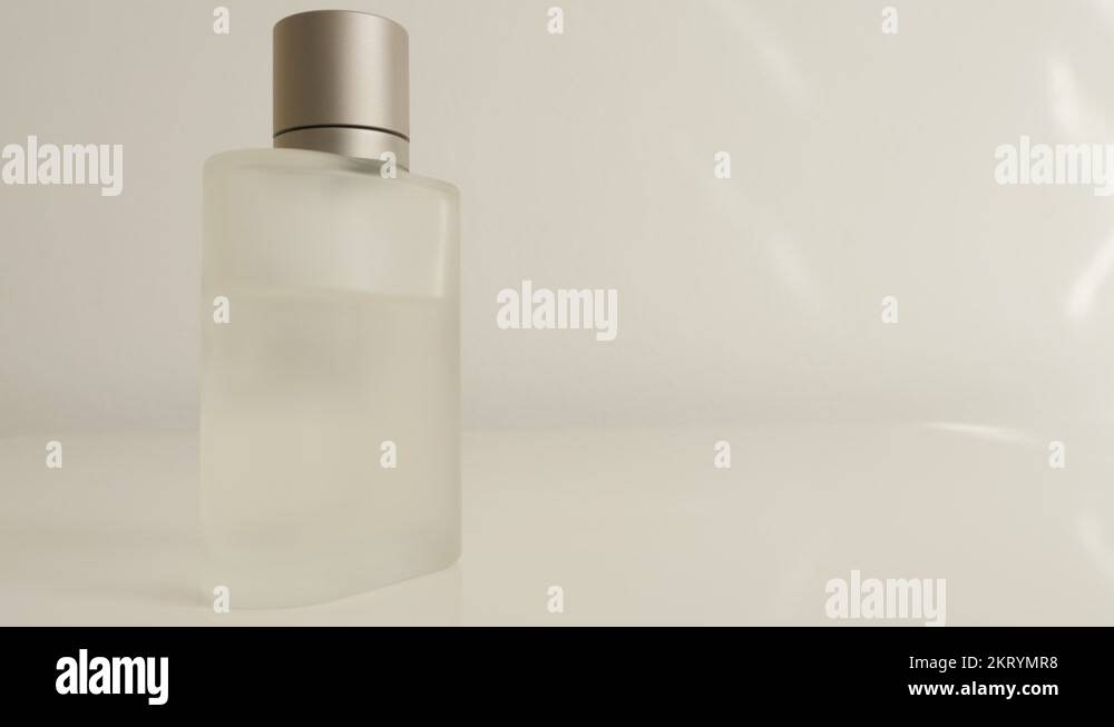 Luxurious parfum bottle slow tilt on white background 4K 3840X2160 ...