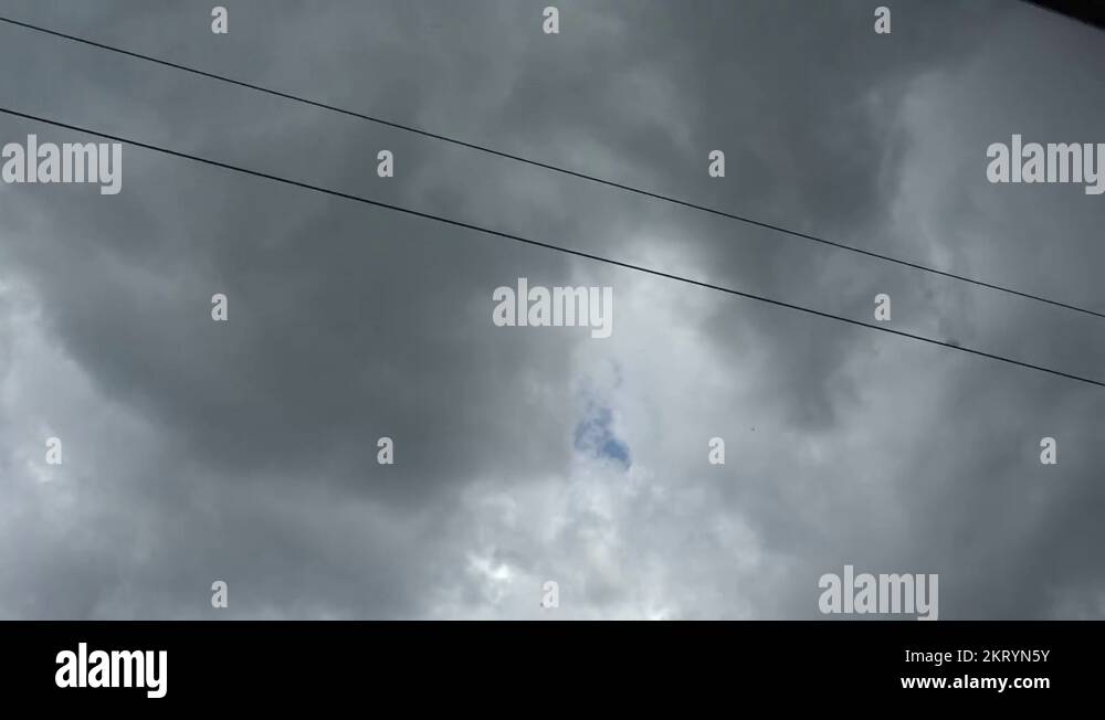 4K POV Point of view train motion wire window view dramatic clouds dark ...