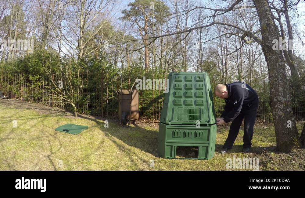 Gardener man assemble plastic compost box. Timelapse. 4K Stock Video ...