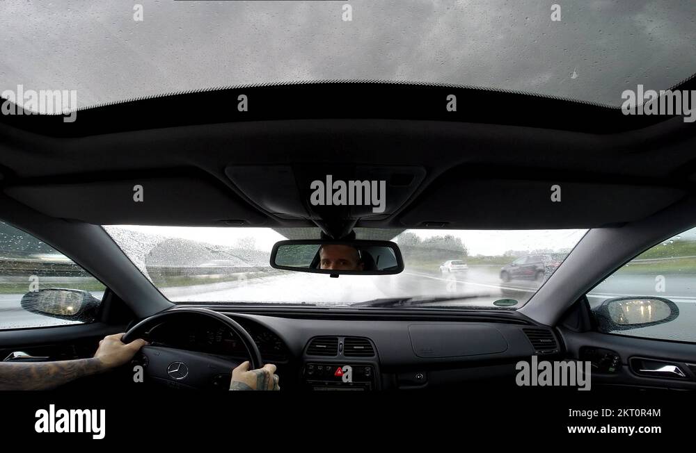 Dash cam car driving panorama on rainy german highway Stock Video ...