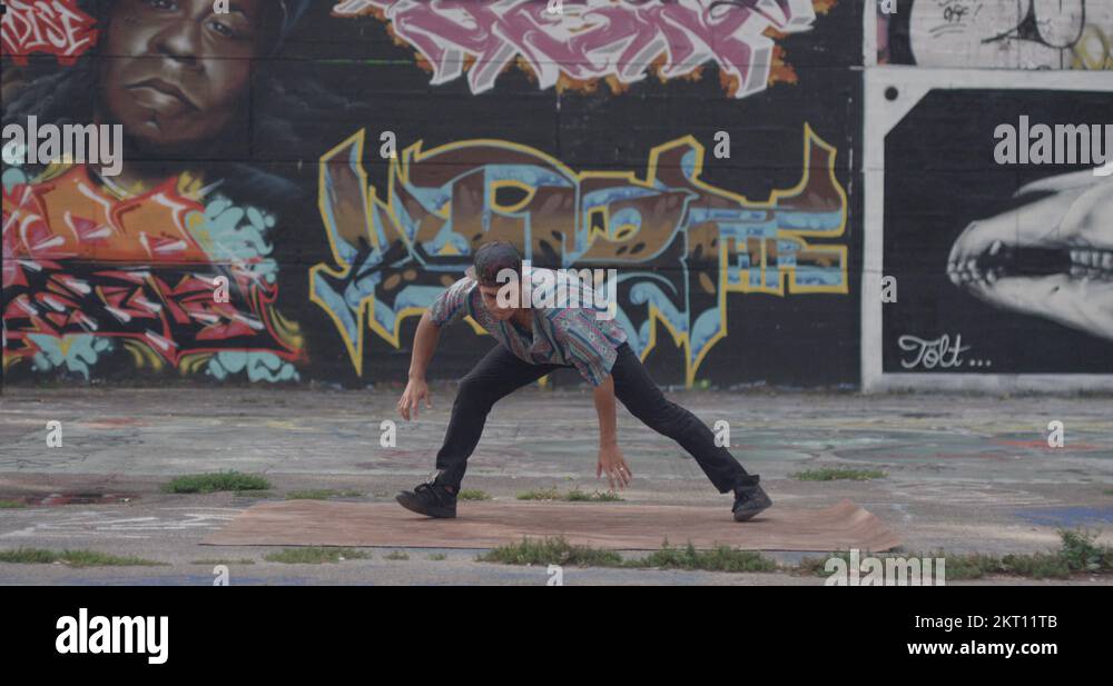 Male Break Dancer in Urban Setting Laying down Routine Stock Video ...