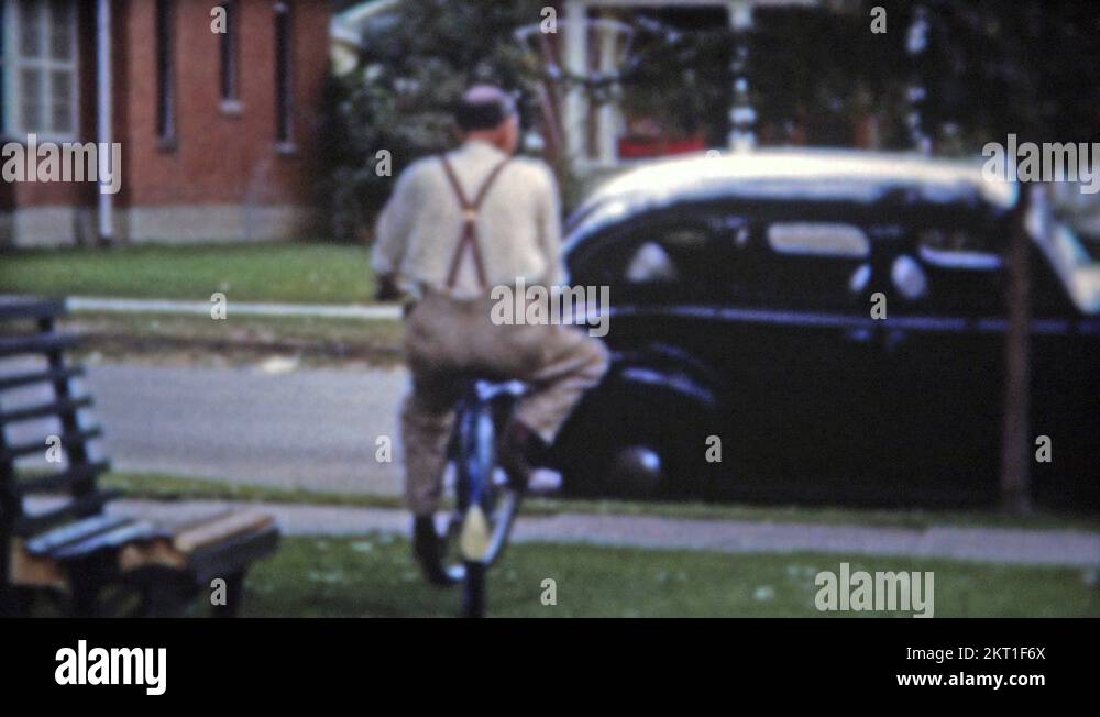 1953: Grandpa's first ride on a bicycle since the 1800's! Stock Video ...