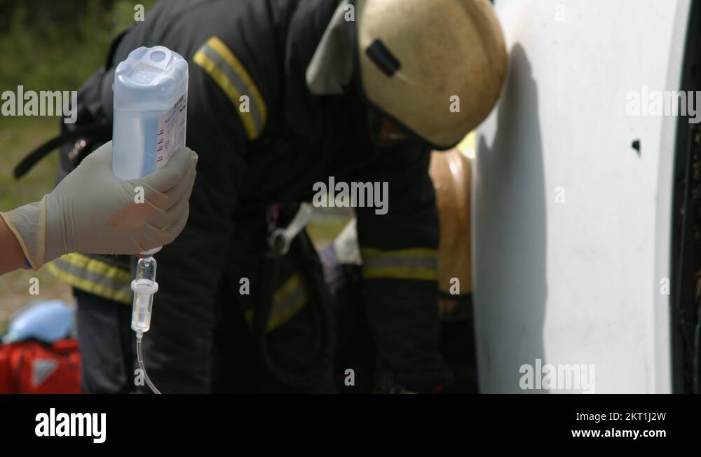 paramedics help a victim of the car accident Stock Video Footage - Alamy