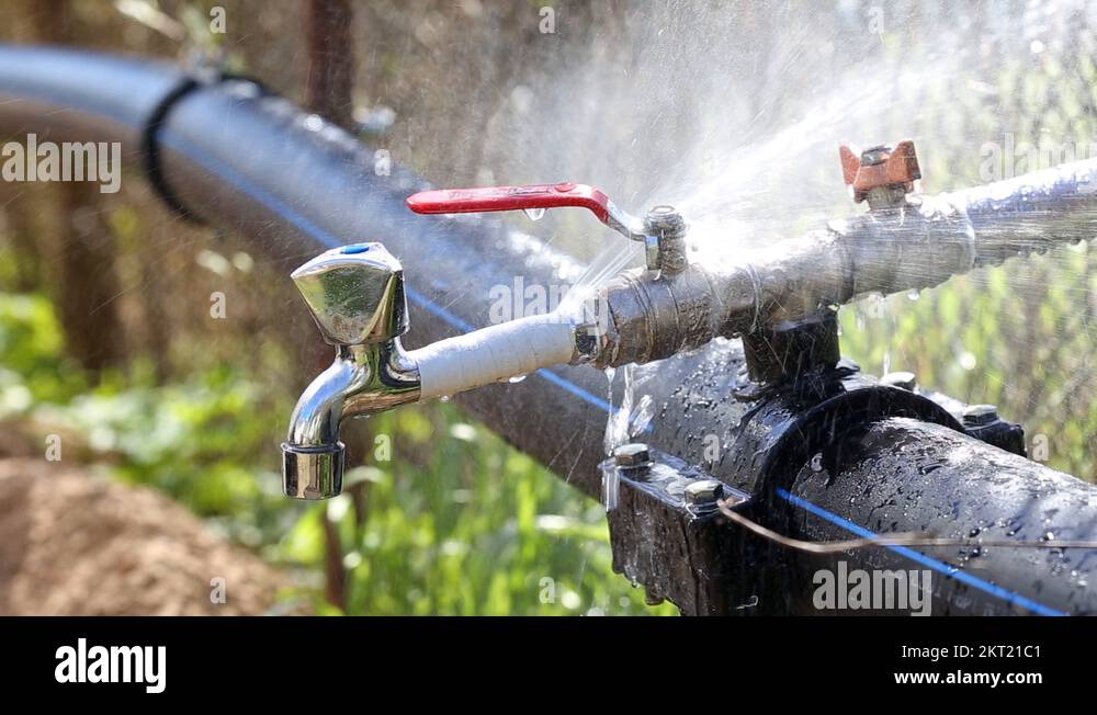 Water Leaking from broken faucet Stock Video Footage - Alamy