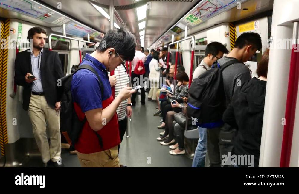 Door open with loud alert signal, passengers alight from and to metro ...