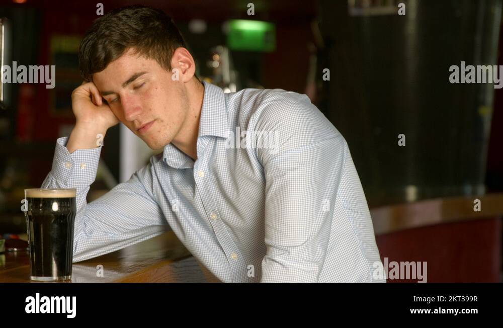 Stressed man sitting Stock Videos & Footage - HD and 4K Video Clips - Alamy