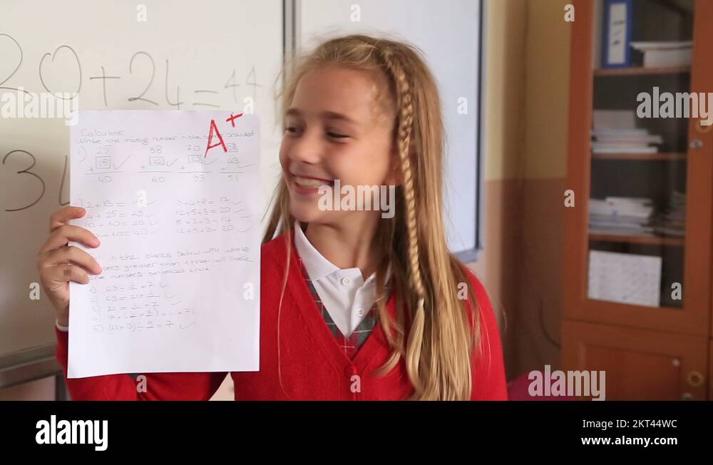 Child with an a grade in paper Stock Videos & Footage - HD and 4K Video ...