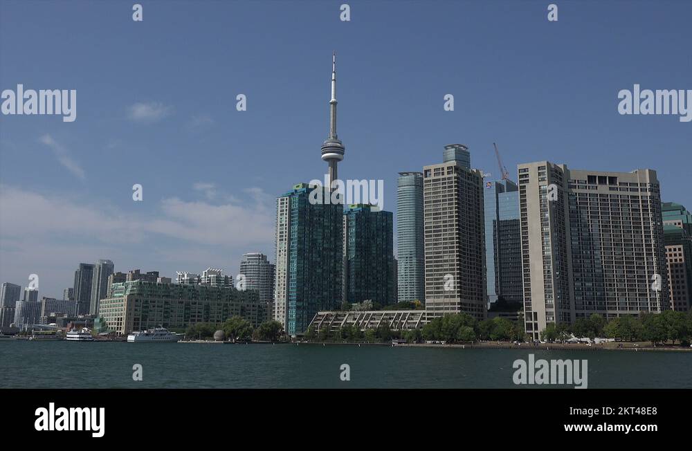 Queens Quay and Waterfront docks and CN Tower, Toronto skyline, Canada ...