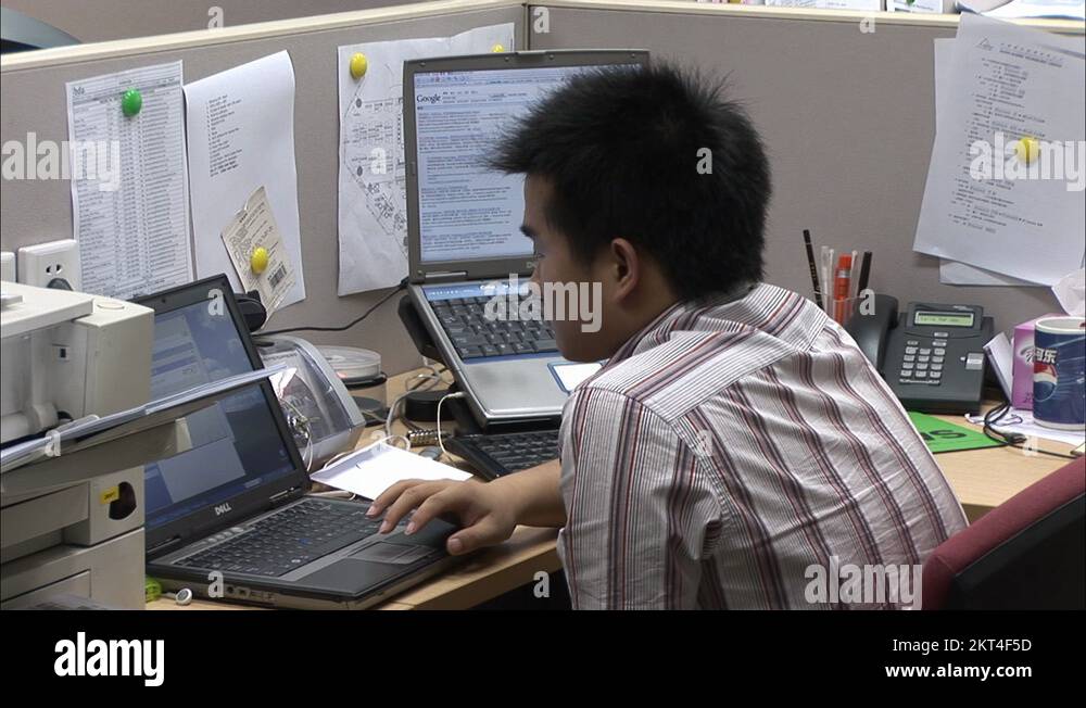 Chinese man working Stock Videos & Footage - HD and 4K Video Clips - Alamy