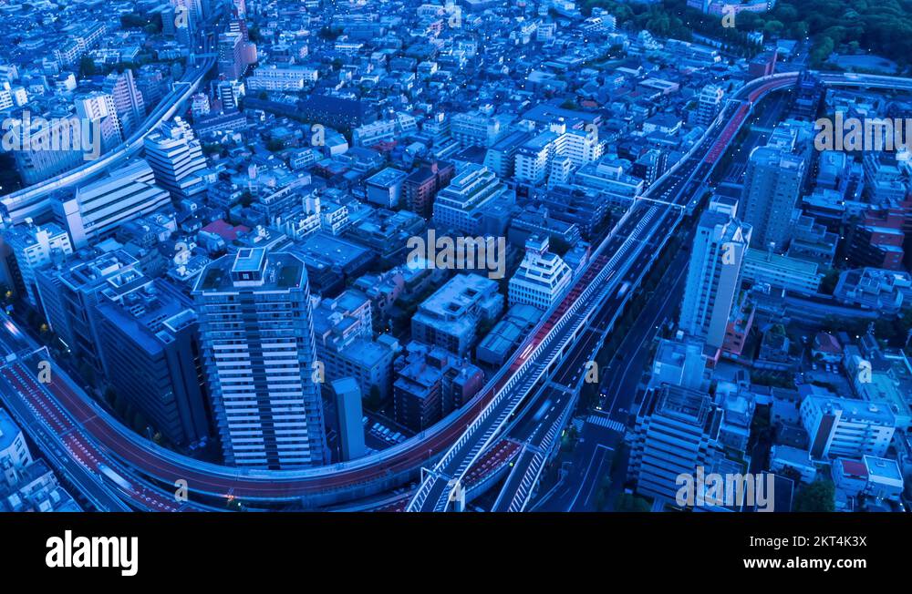 Night turns to day over a massive highway intersection in Tokyo, Japan ...