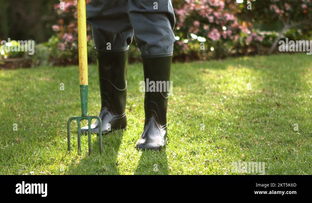 Man standing in grass rake Stock Videos & Footage - HD and 4K Video ...